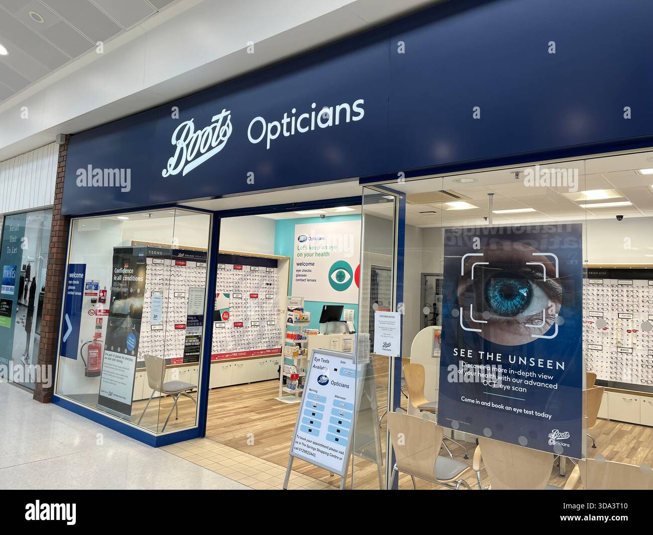 Boots opticians shop front on the street Buxton, Derbyshire England UK ...