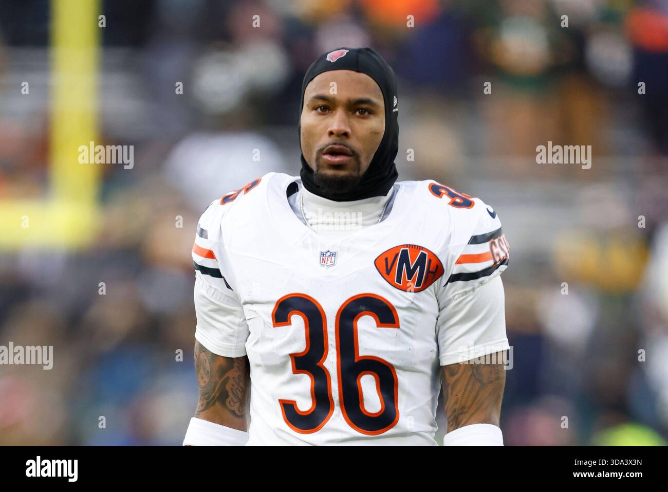 Chicago Bears safety Jonathan Owens (36) walks on the field before an ...