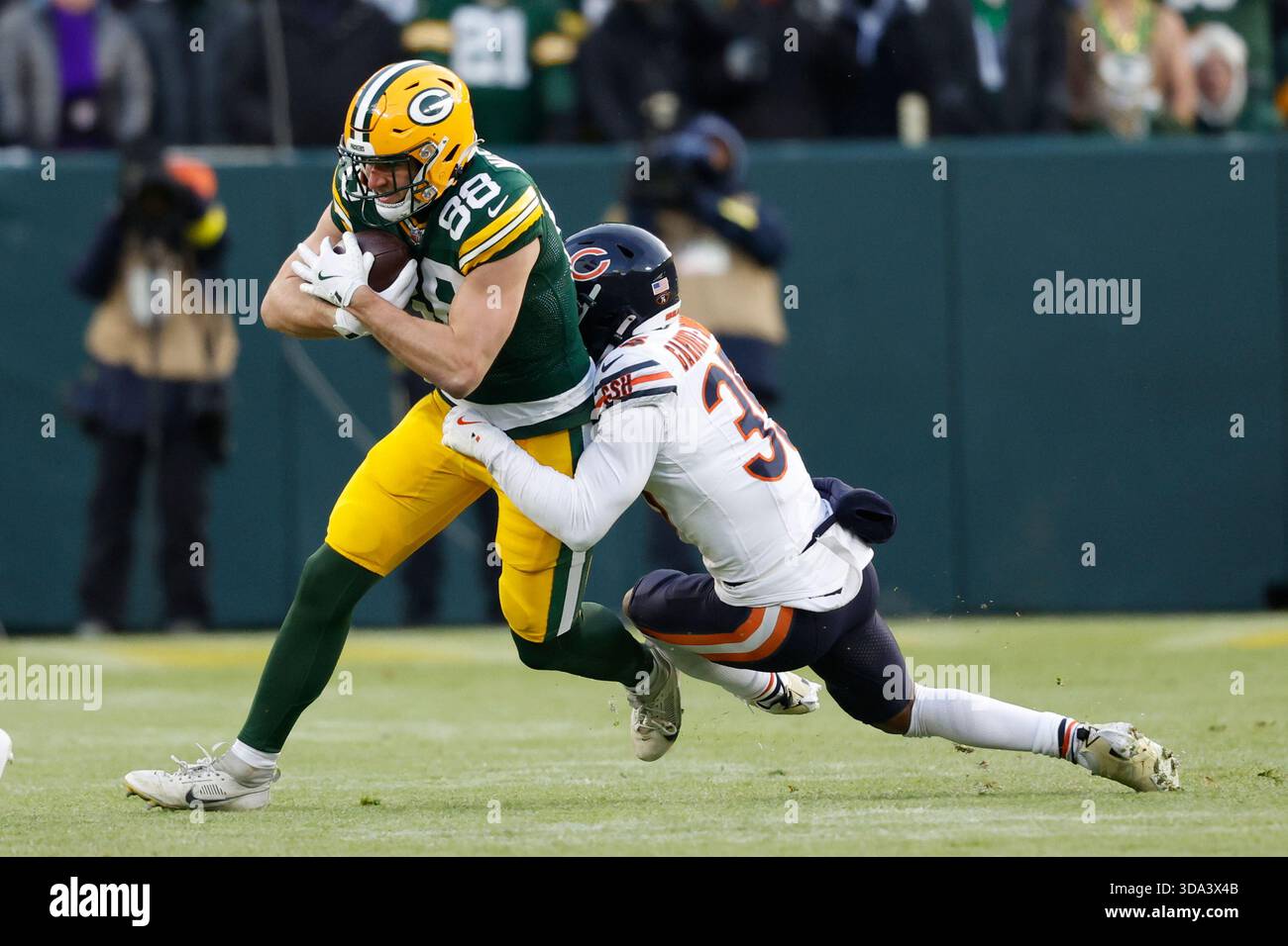 Green Bay Packers tight end Luke Musgrave (88) runs with the ball ...