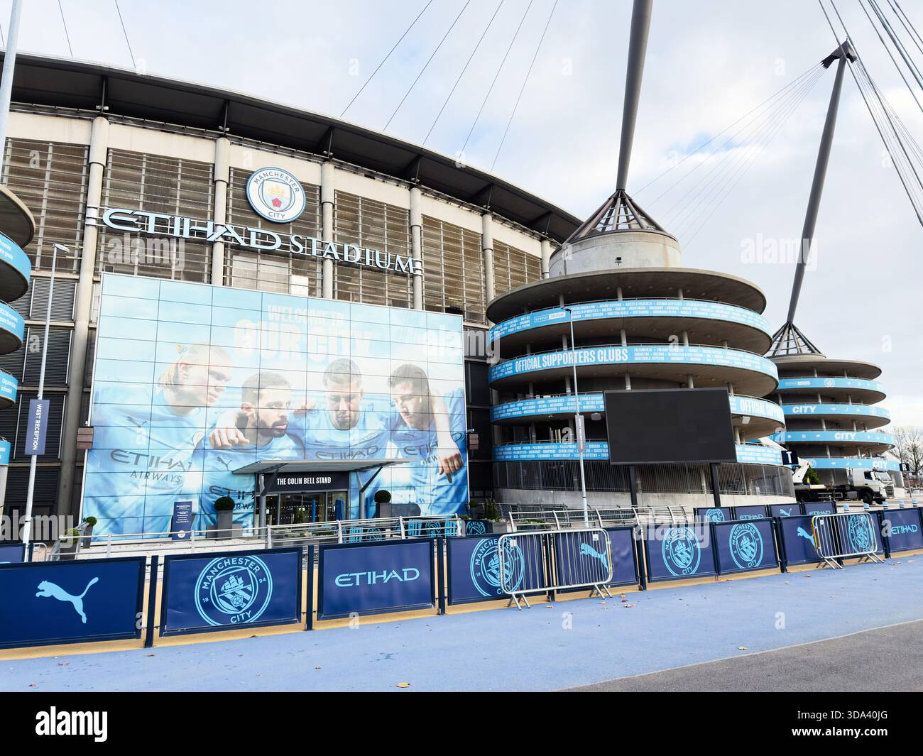 Manchester, UK - November 16, 2025: A modern stadium exterior with blue ...
