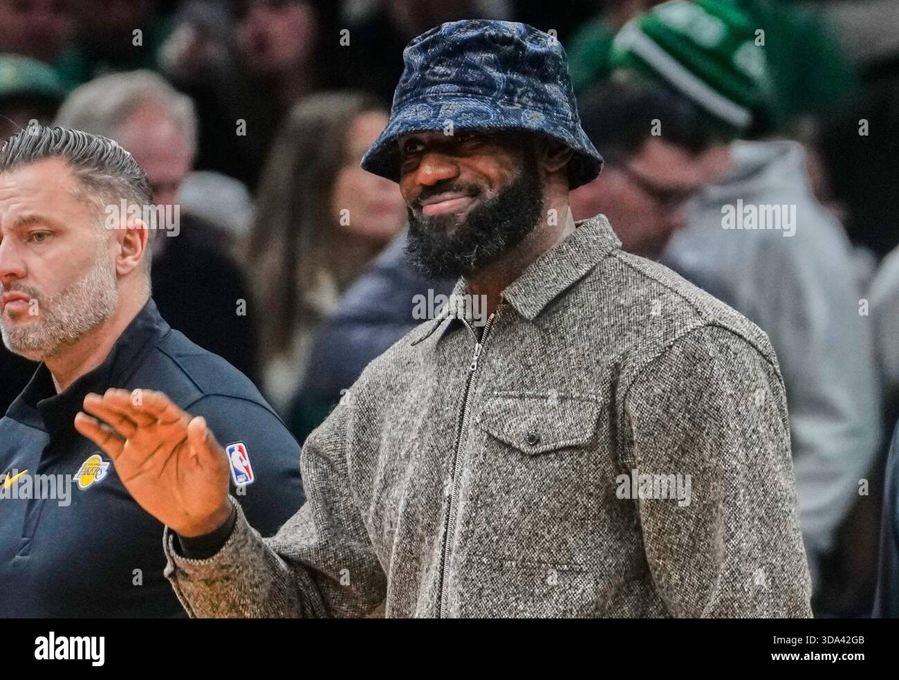 Los Angeles Lakers forward Lebron James waves during an NBA basketball ...