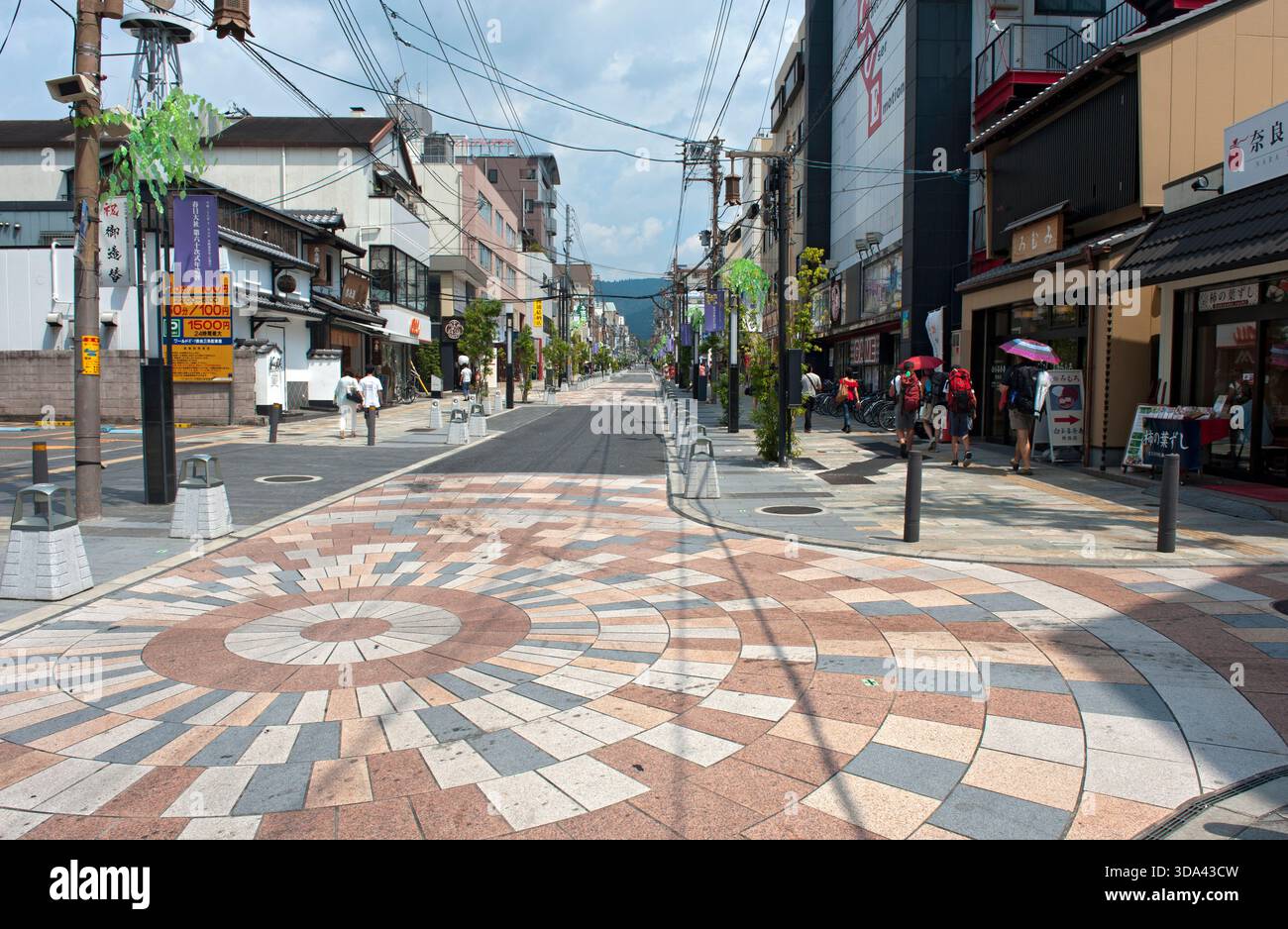 Sanjo-dori Street, the main commercial street of Nara City (奈良市) is ...