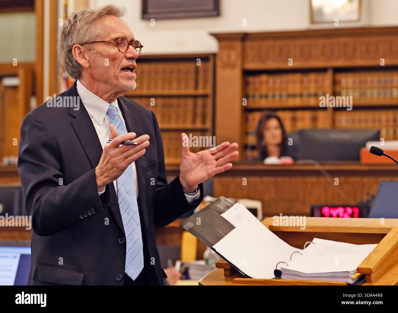 Defense attorney Larry Tipton cross examines state medical examiner Dr ...