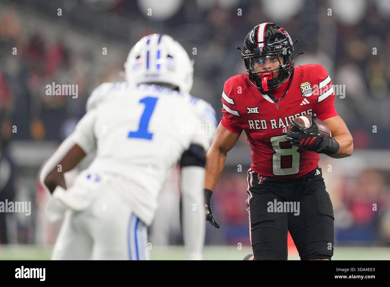 Texas Tech running back Cameron Dickey (8) carries the ball as BYU ...