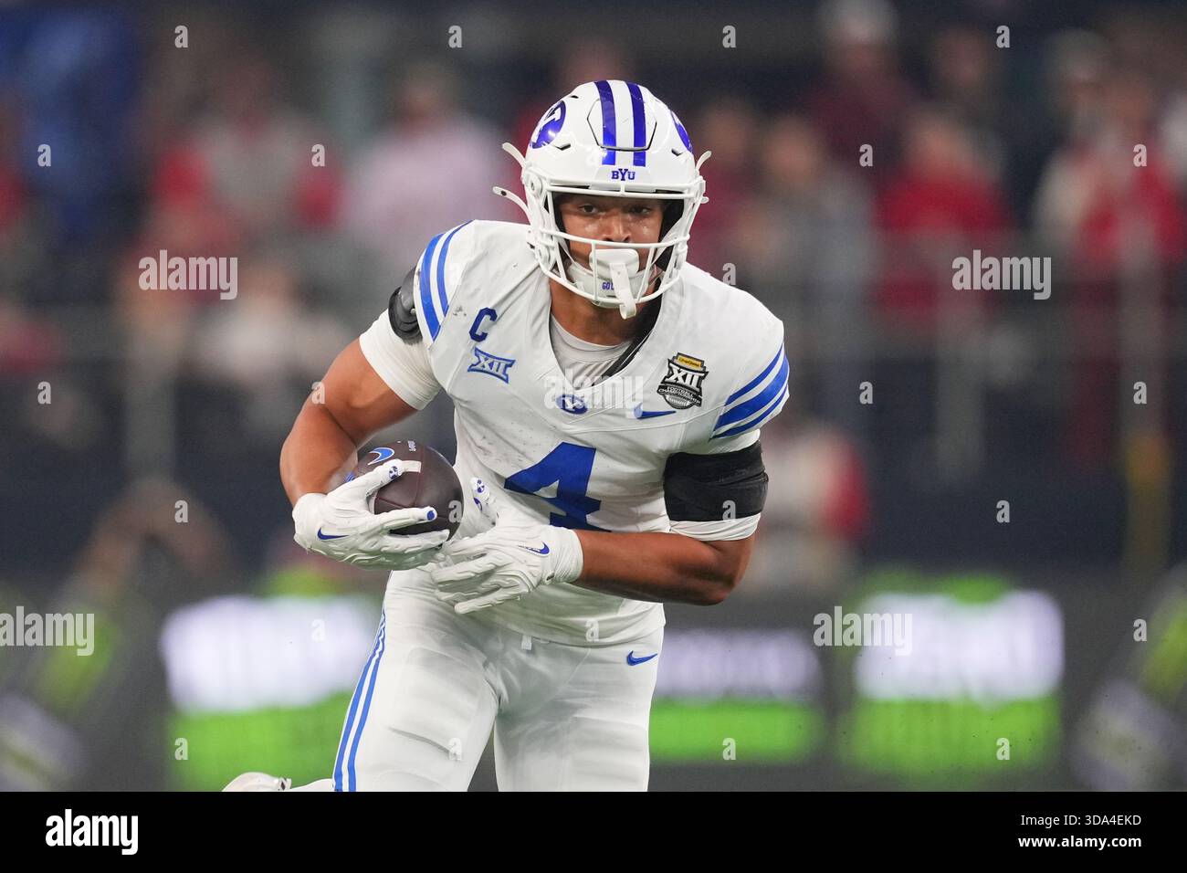 BYU running back LJ Martin (4) runs after making a catch against Texas ...