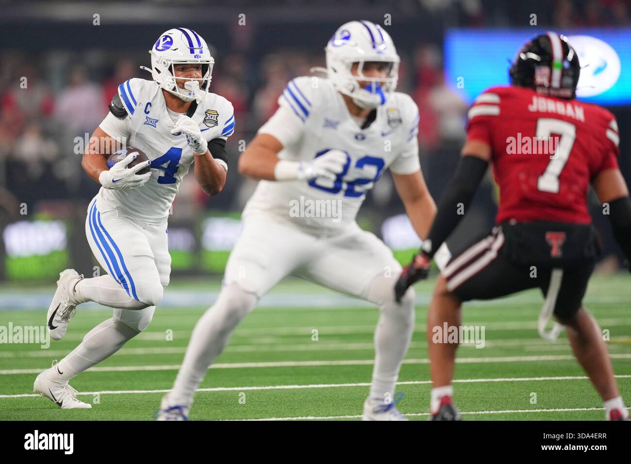 BYU running back LJ Martin (4) runs the ball against Texas Tech during ...