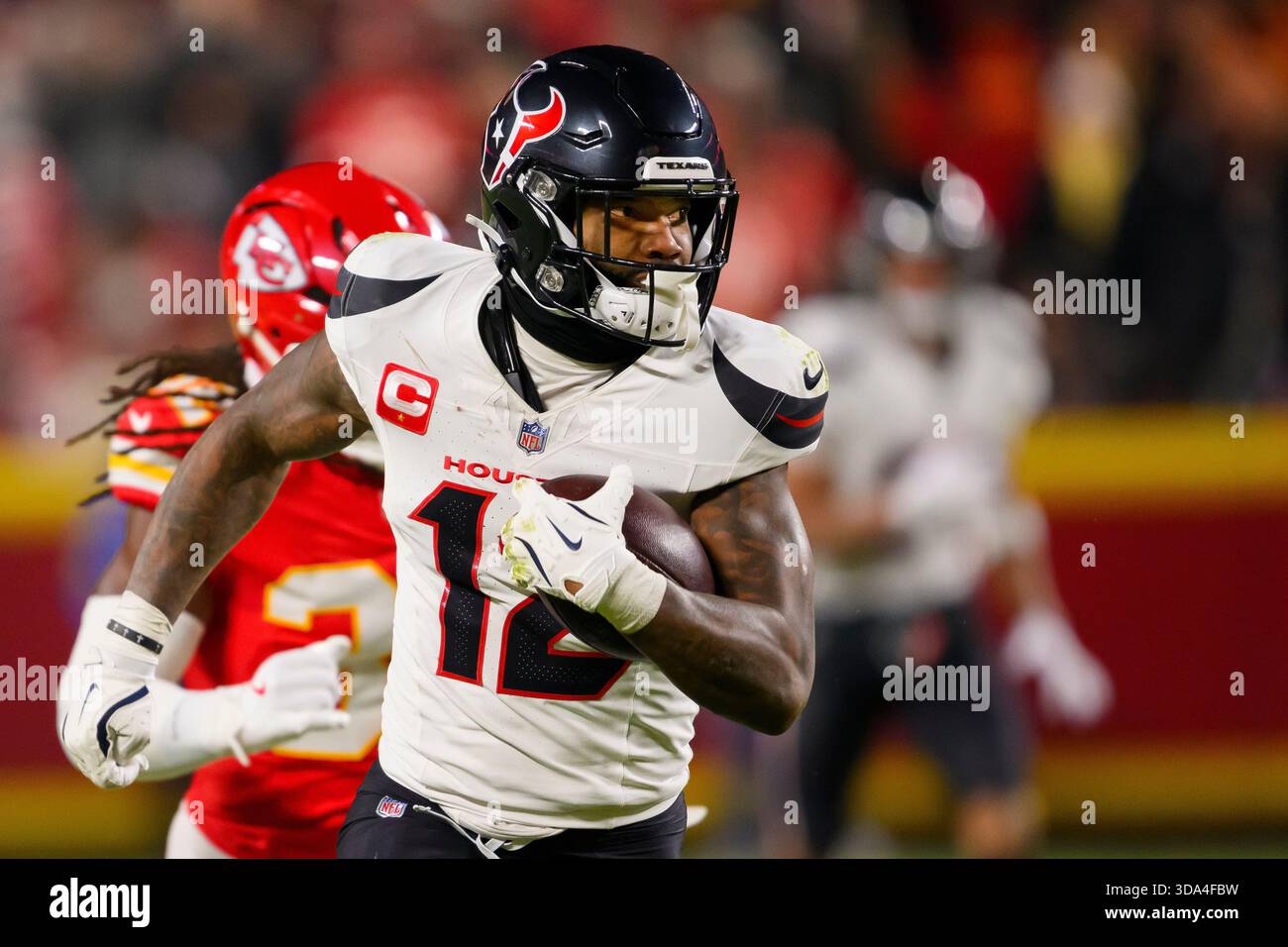 Houston Texans wide receiver Nico Collins (12) runs for a first down ...