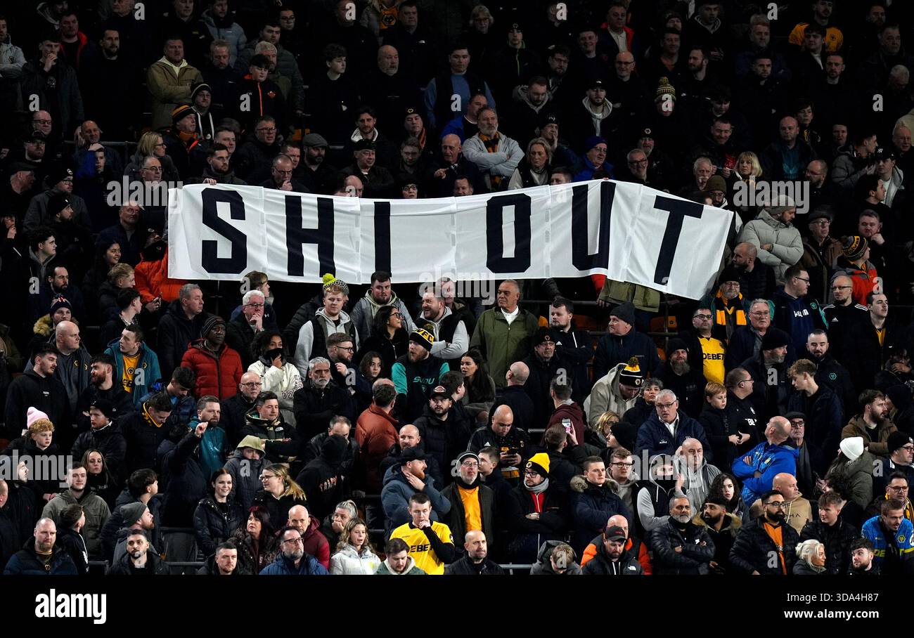 Wolverhampton Wanderers fans in the stands with a banner in protest ...
