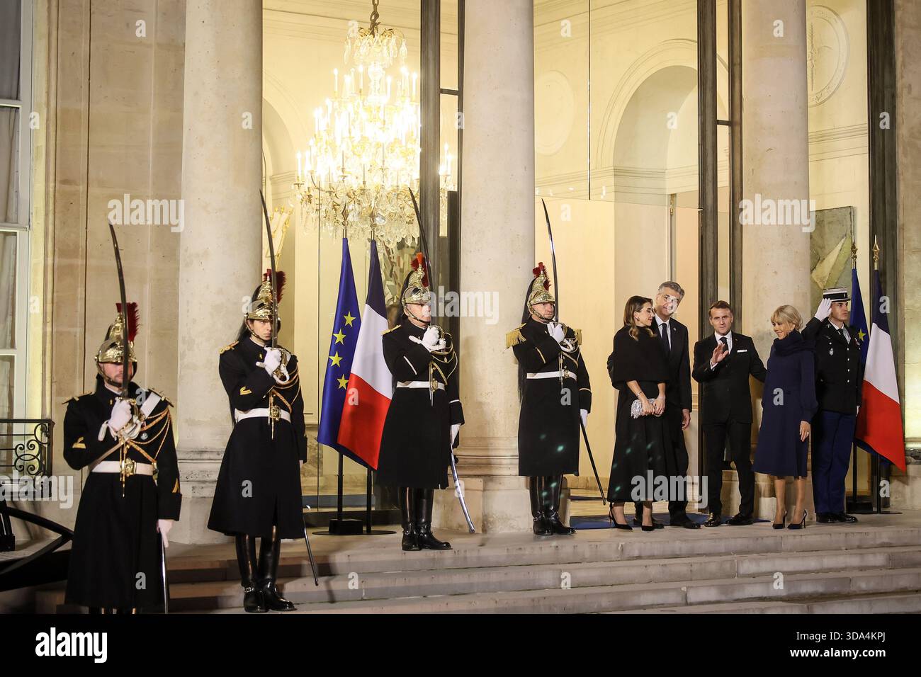 French President Emmanuel Macron and his wife Brigitte Macron pose with ...