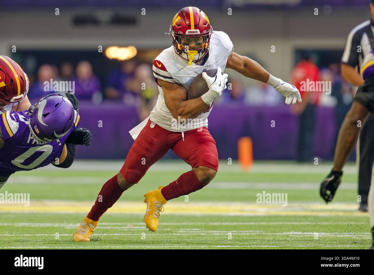 Washington Commanders Running Back Jeremy McNichols (26) runs through ...