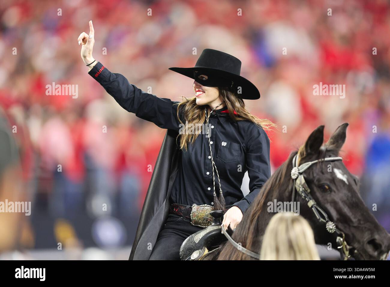 ARLINGTON, TX - DECEMBER 06: The Texas Tech Masked Rider entertains the ...