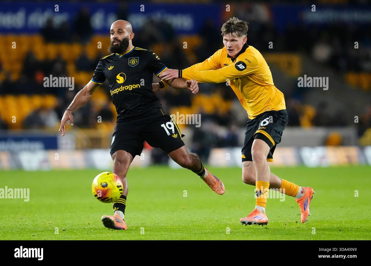 Manchester United's Bryan Mbeumo (left) and Wolverhampton Wanderers ...