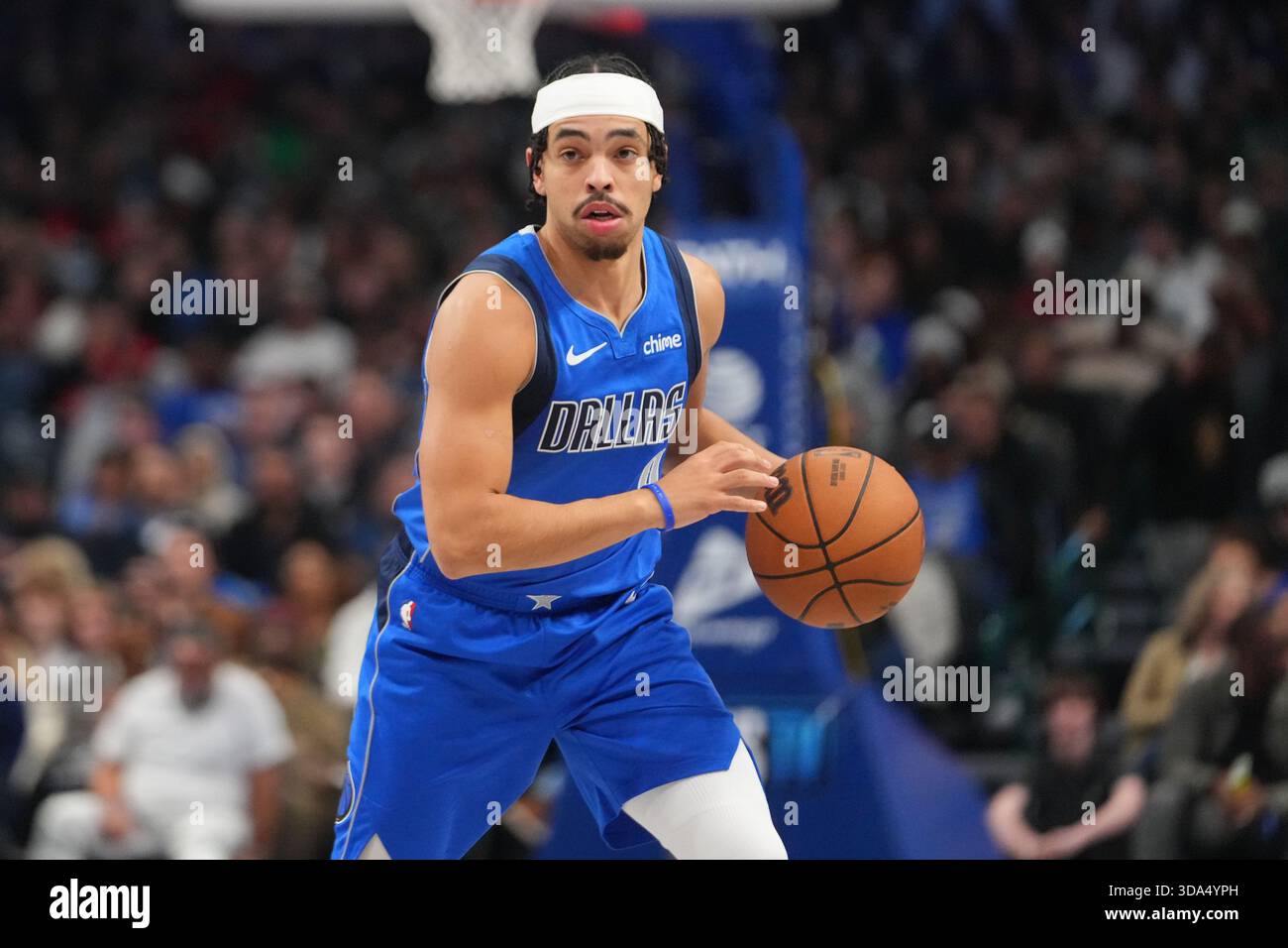 Dallas Mavericks guard Ryan Nembhard (9) dribbles during the first half ...