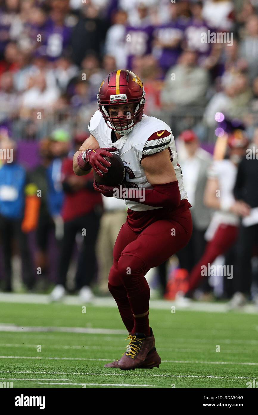 Washington Commanders tight end Zach Ertz (86) carries the ball during ...