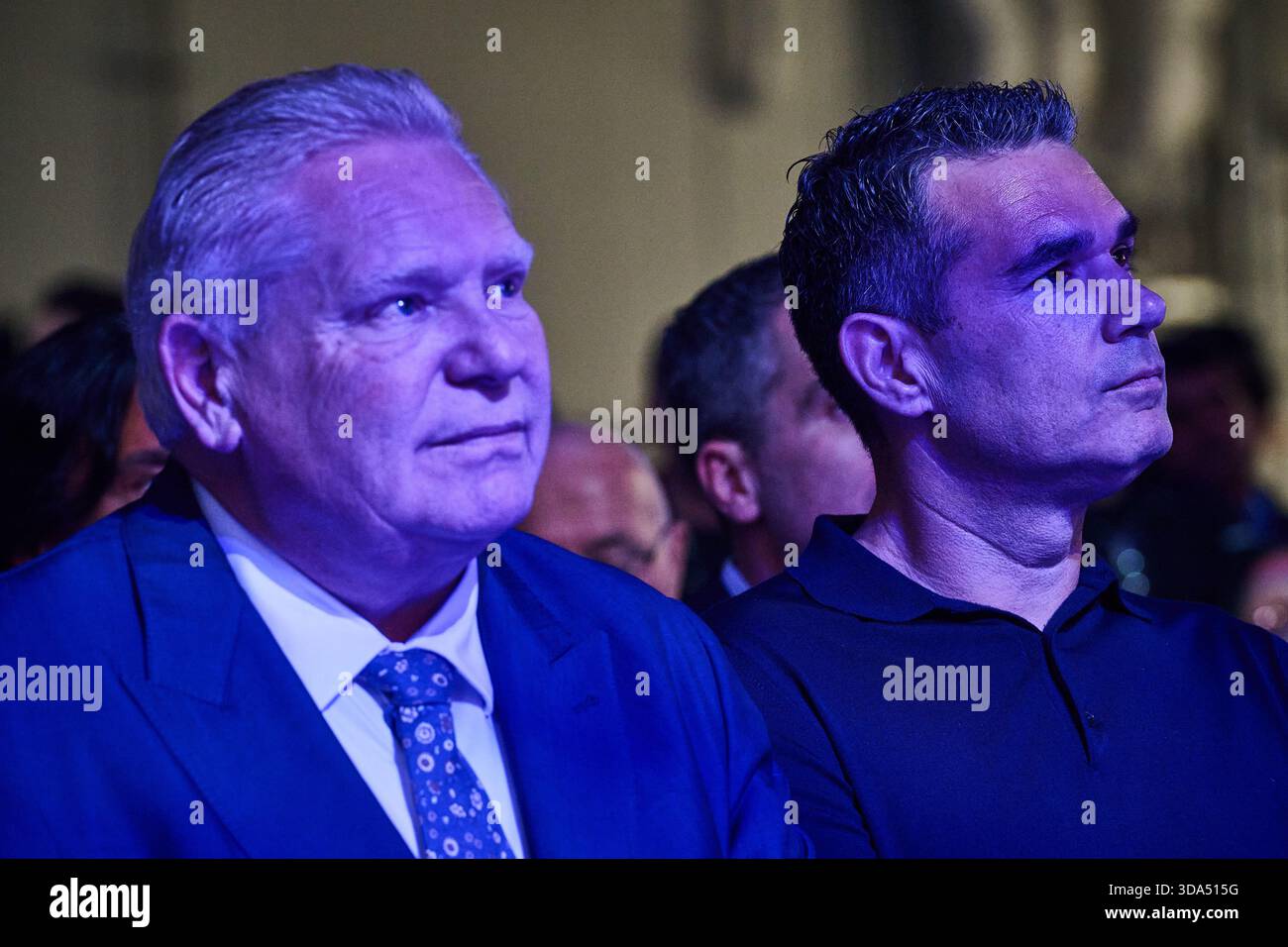 Ontario Premier Doug Ford, left, and GFL CEO Patrick Dovigi look on ...