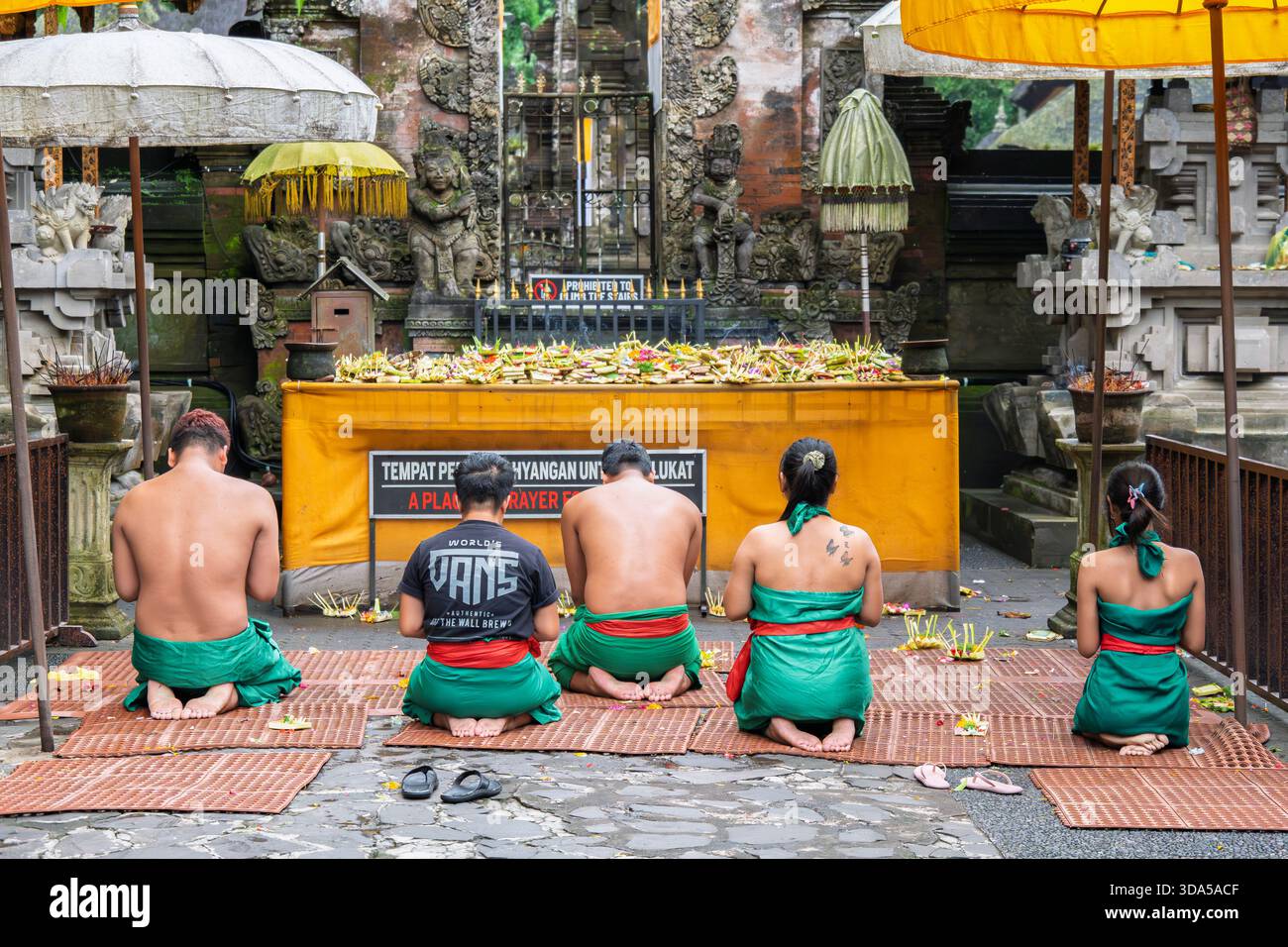 Pura Tirta Empul Bali 14 11 2025 – visitors performing a traditional ...