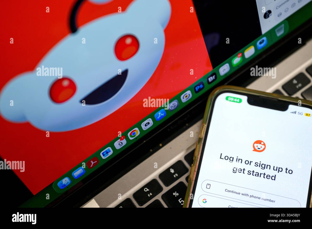 Generic image of social networking app Reddit displayed on an Apple ...