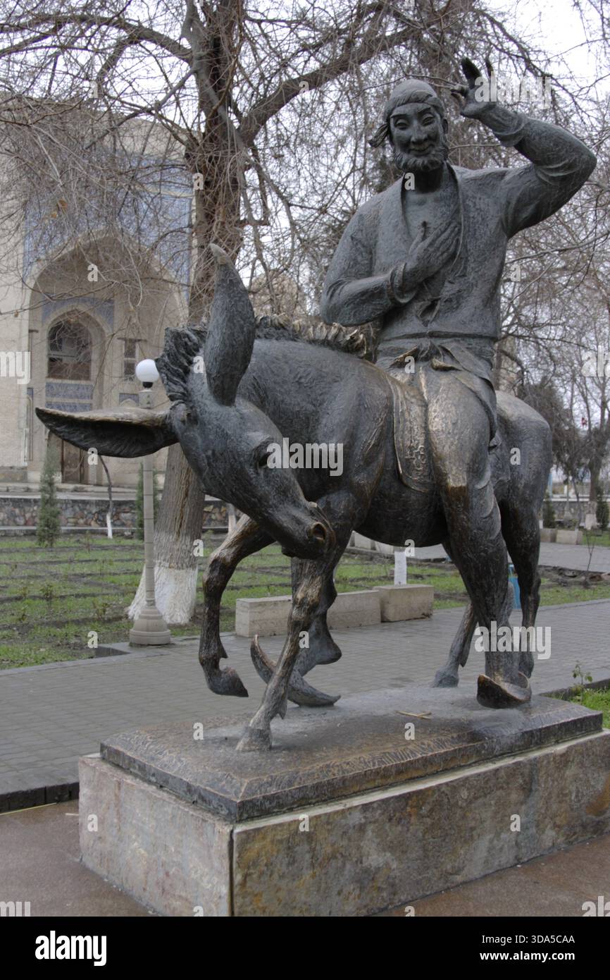 The statue of Mullah Hoja Nasruddin riding his monkey, Uzbekistan Stock ...