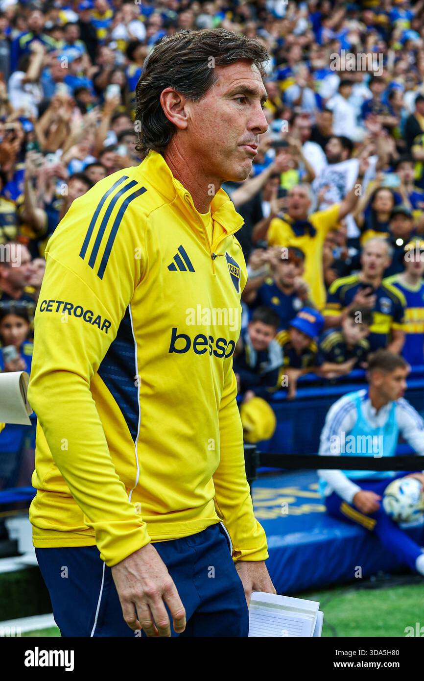 Boca Juniors' head coach Claudio Ubeda enters the pitch before the ...