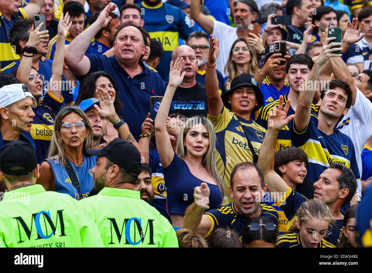 Boca Juniors’ fans cheer for their team before the Argentine ...