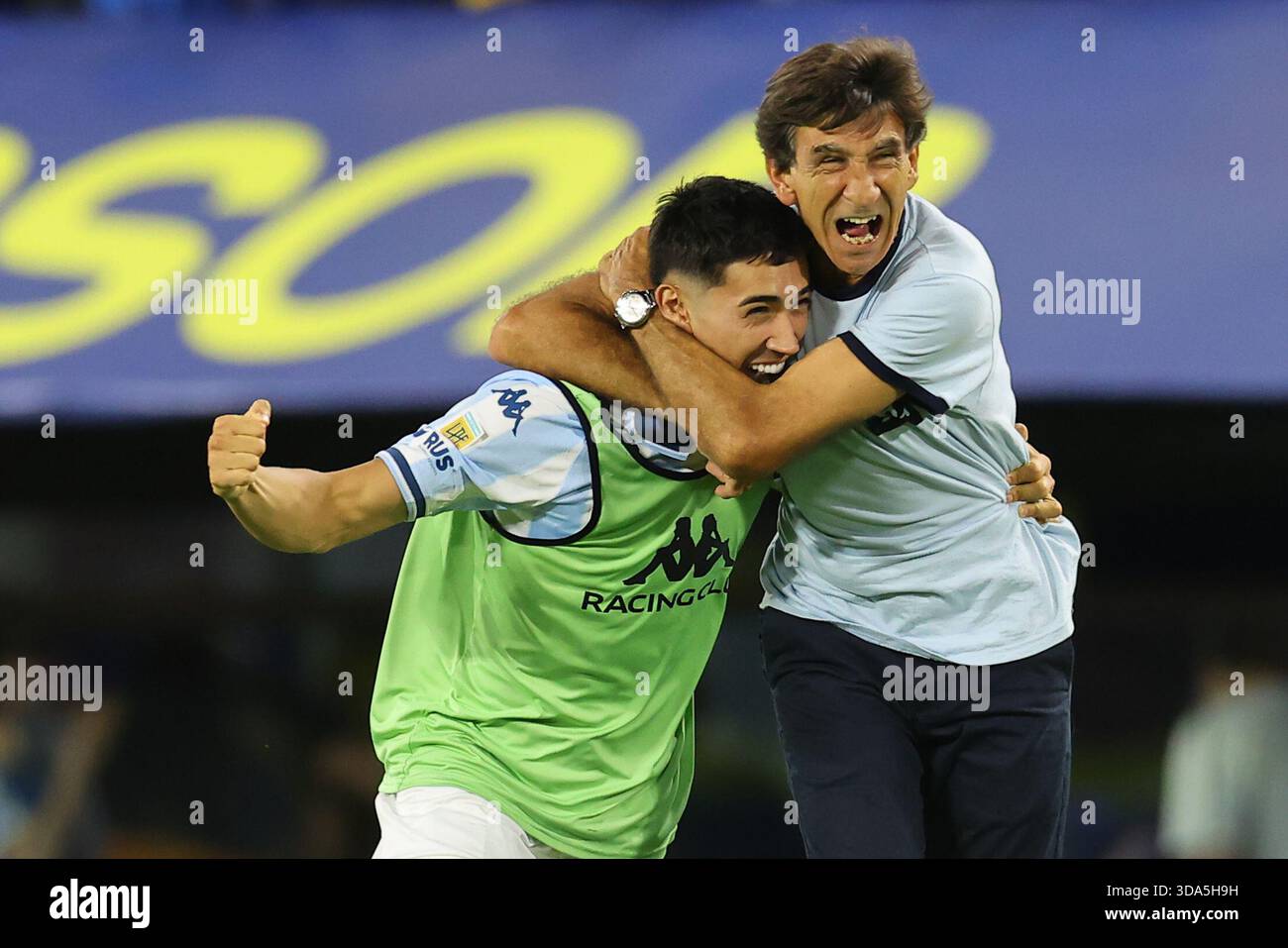 Racing Club’s head coach Gustavo Costas (R) celebrates with forward ...