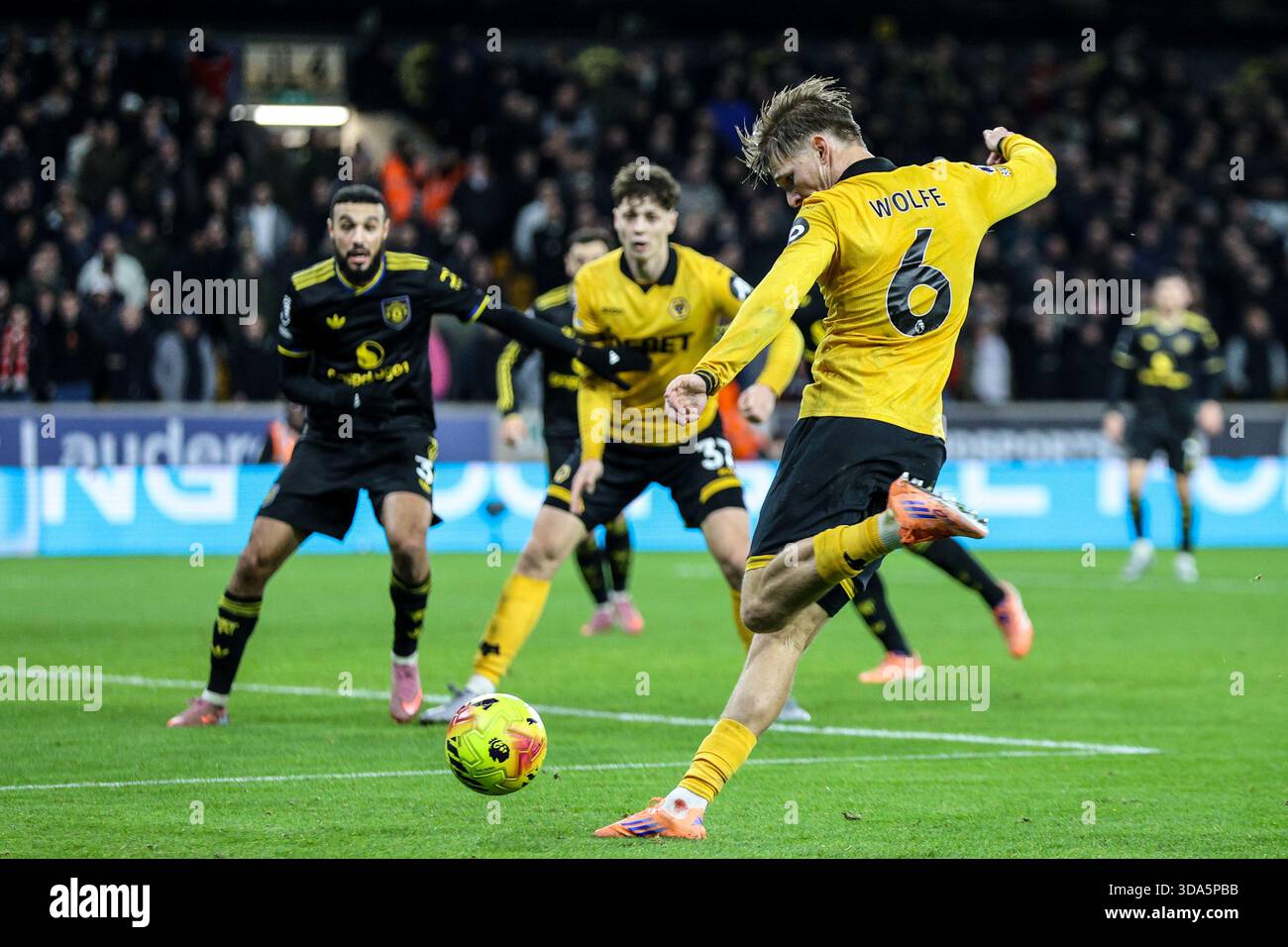David Moller Wolfe (6 Wolves) crosses the ball during the Premier ...