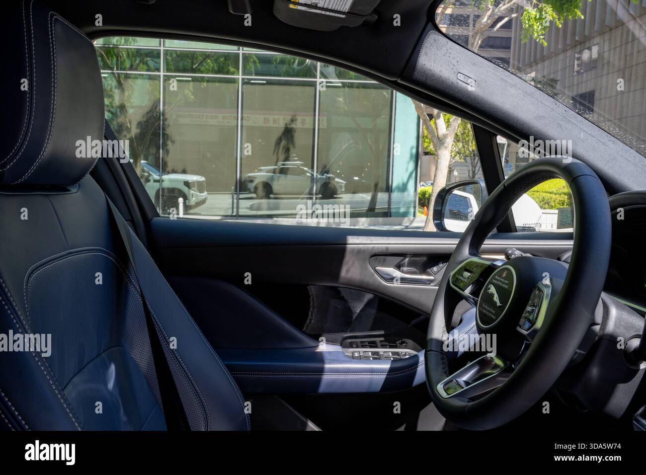 View of driverseat of Waymo self-driving vehicle on a street in San ...
