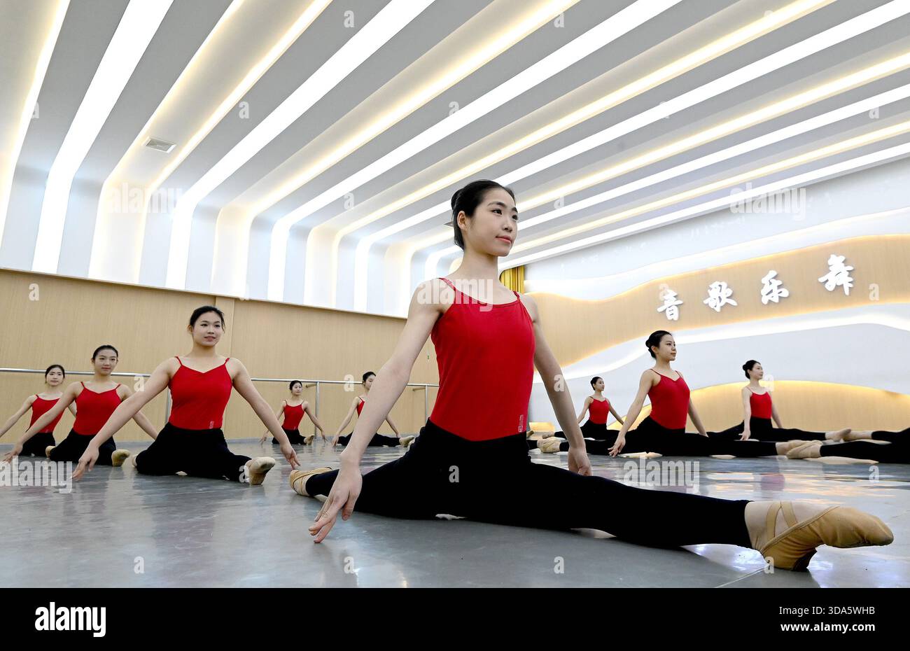 Students aiming for dance majors in colleges practice their skills at a ...