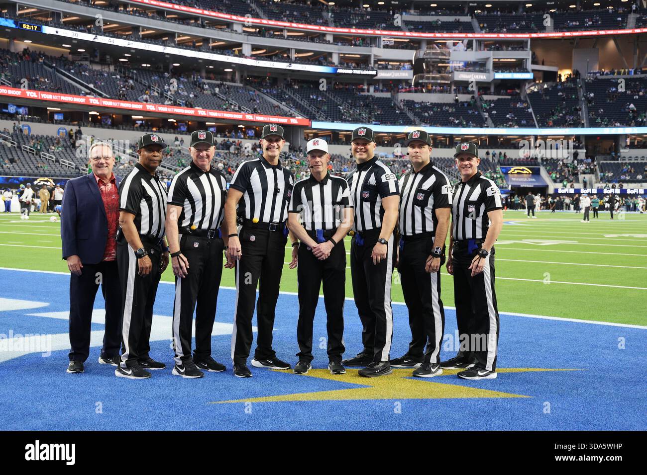 The referee crew including from left, replay official Matt Sumstine ...