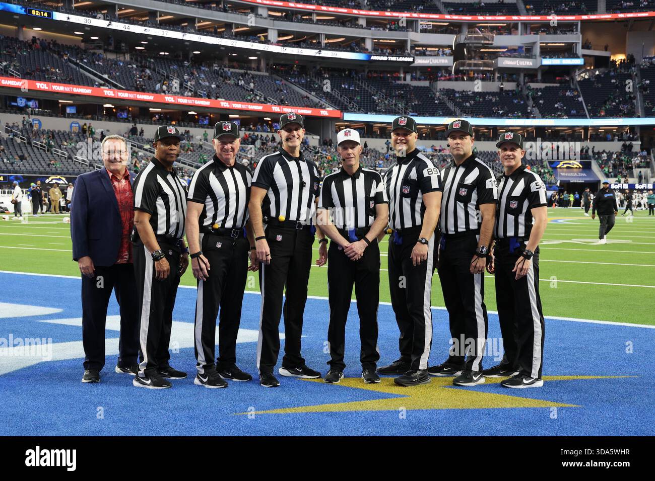 The referee crew including from left, replay official Matt Sumstine ...