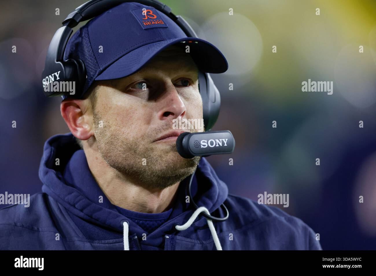Chicago Bears head coach Ben Johnson looks onto the field during an NFL ...