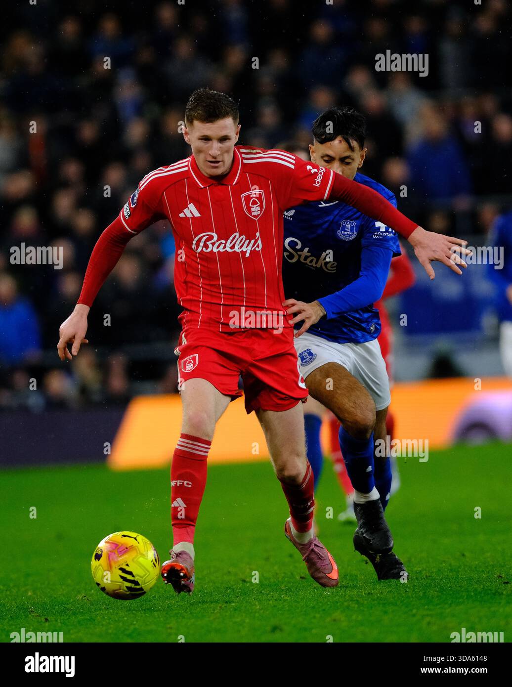 Elliot Anderson of Nottingham Forest and Dwight McNeil of Everton seen ...