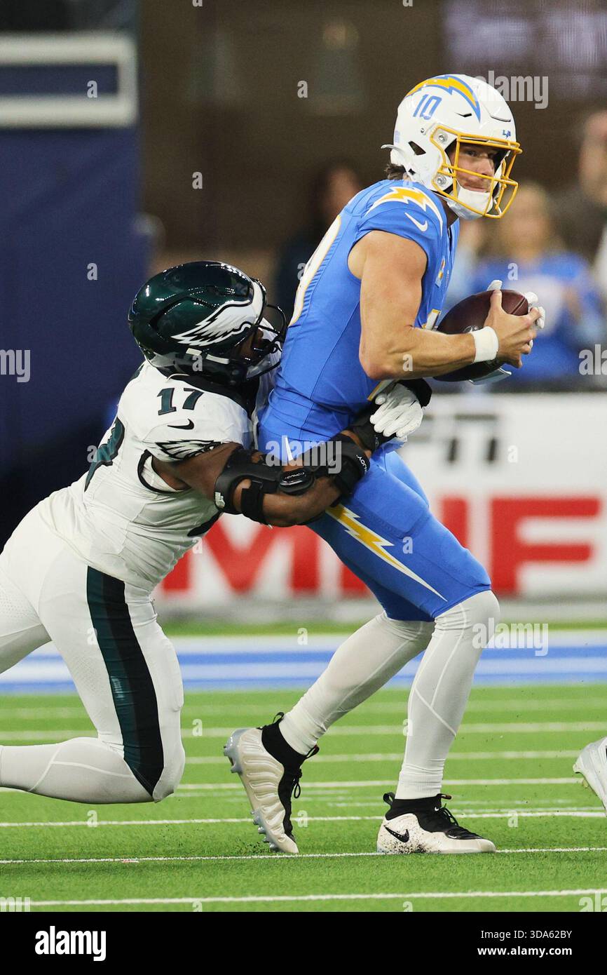 Los Angeles Chargers quarterback Justin Herbert (10) is tackled by ...