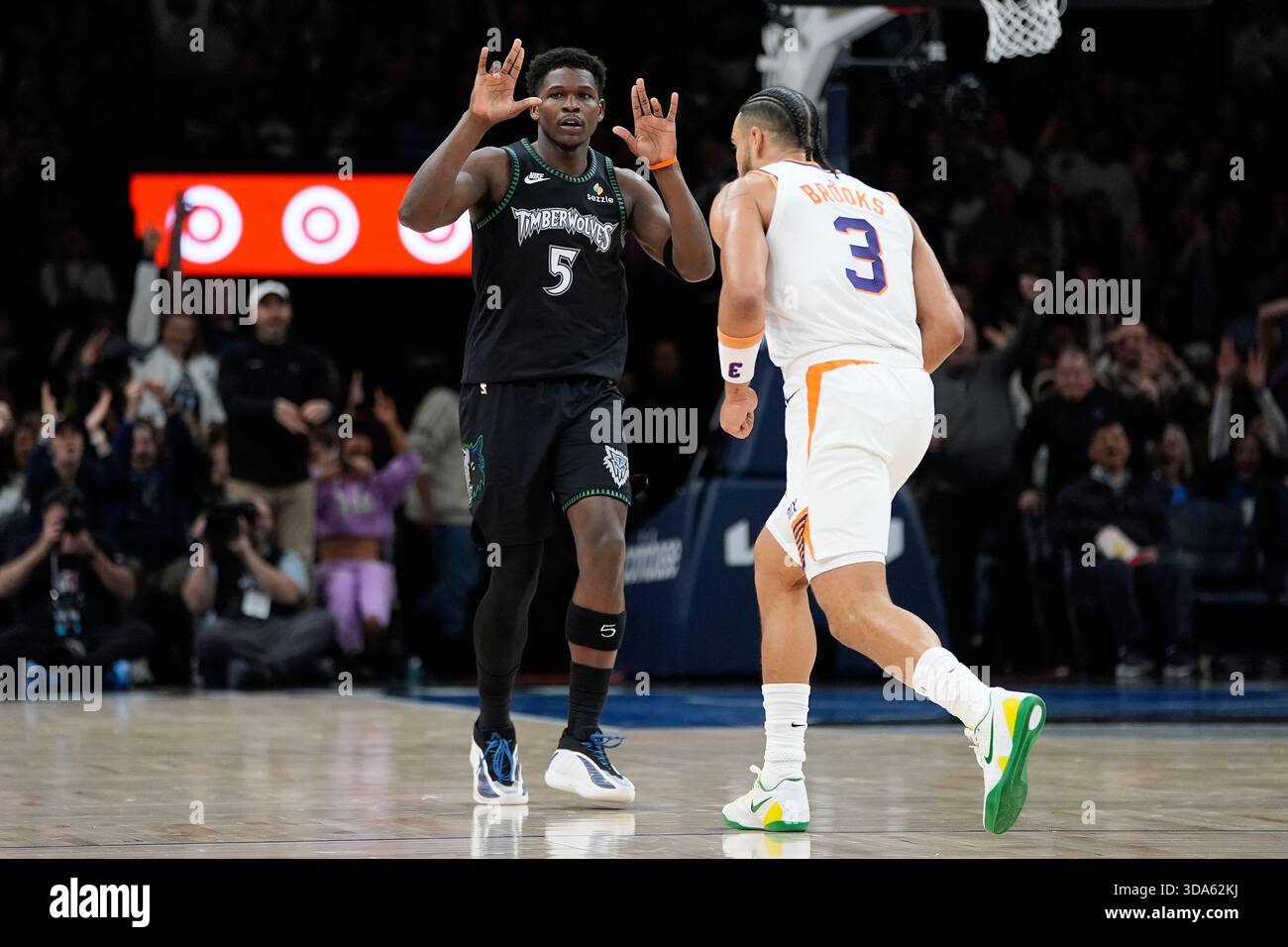 Minnesota Timberwolves guard Anthony Edwards (5) reacts next to Phoenix ...