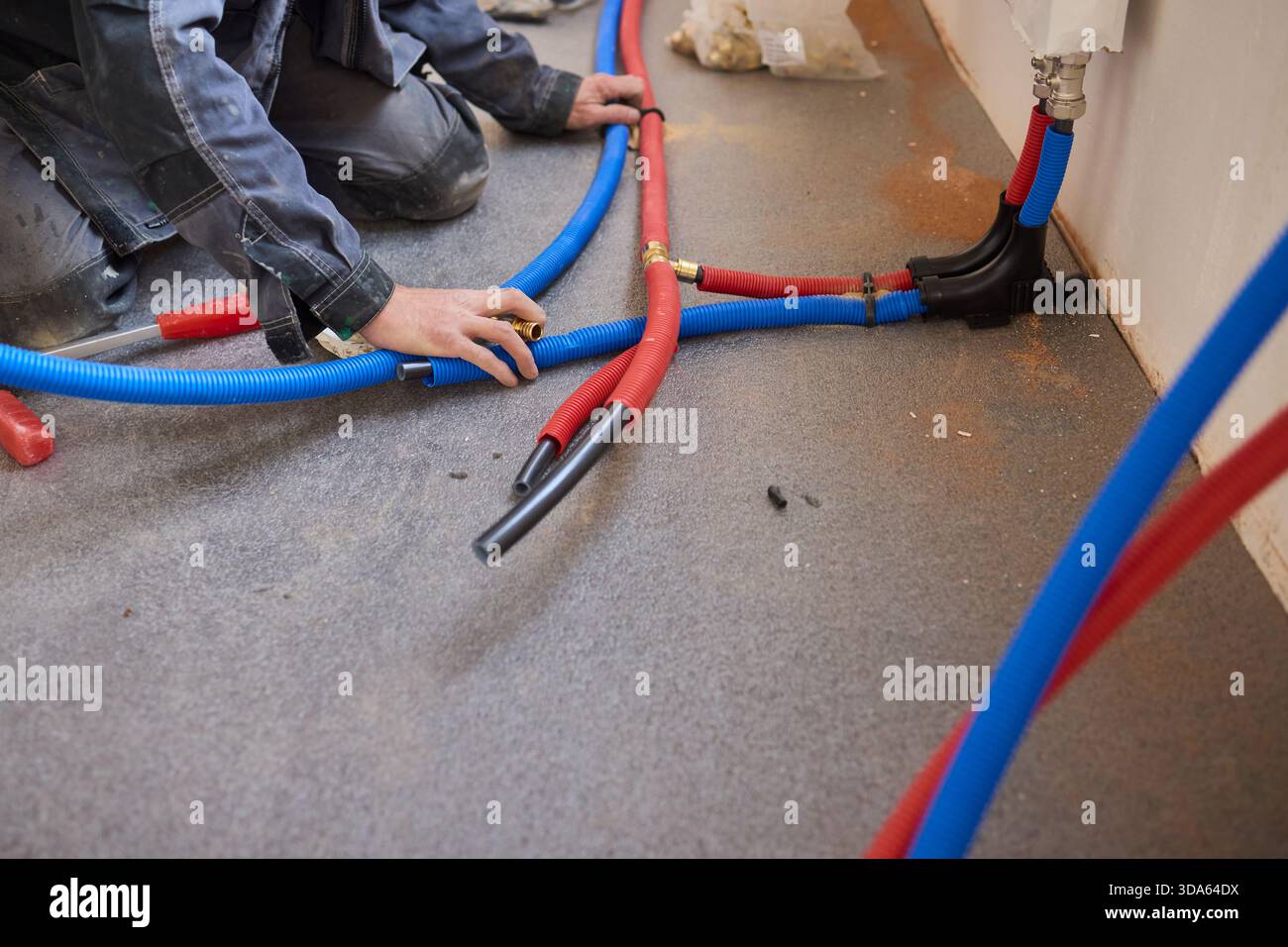 Skilled plumber installing color hi-res stock photography and images ...