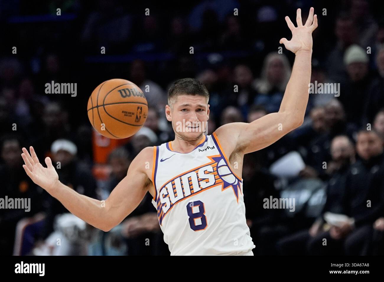 Phoenix Suns guard Grayson Allen (8) loses control of the ball during ...