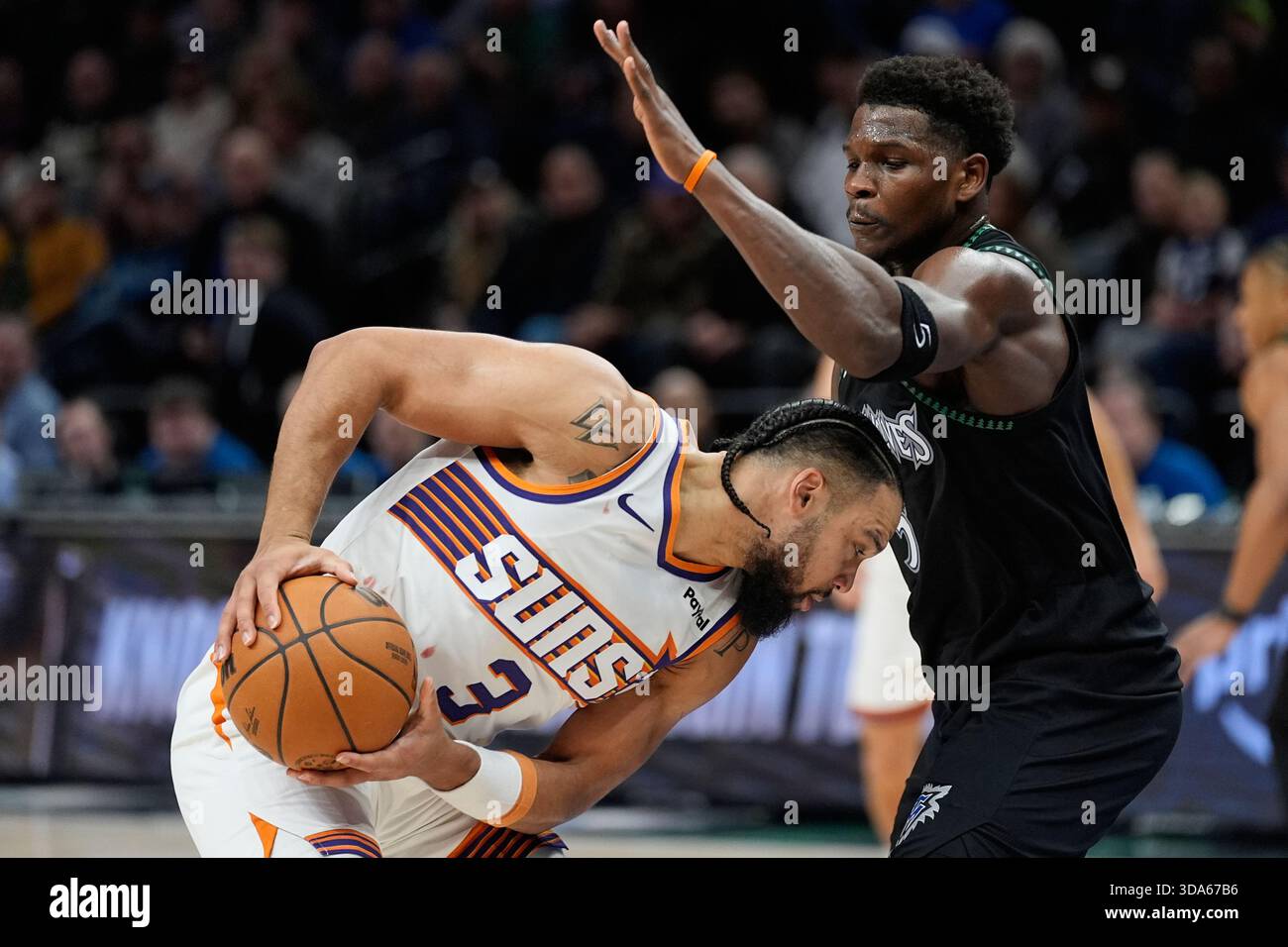Phoenix Suns forward Dillon Brooks (3) handles the ball as Minnesota ...