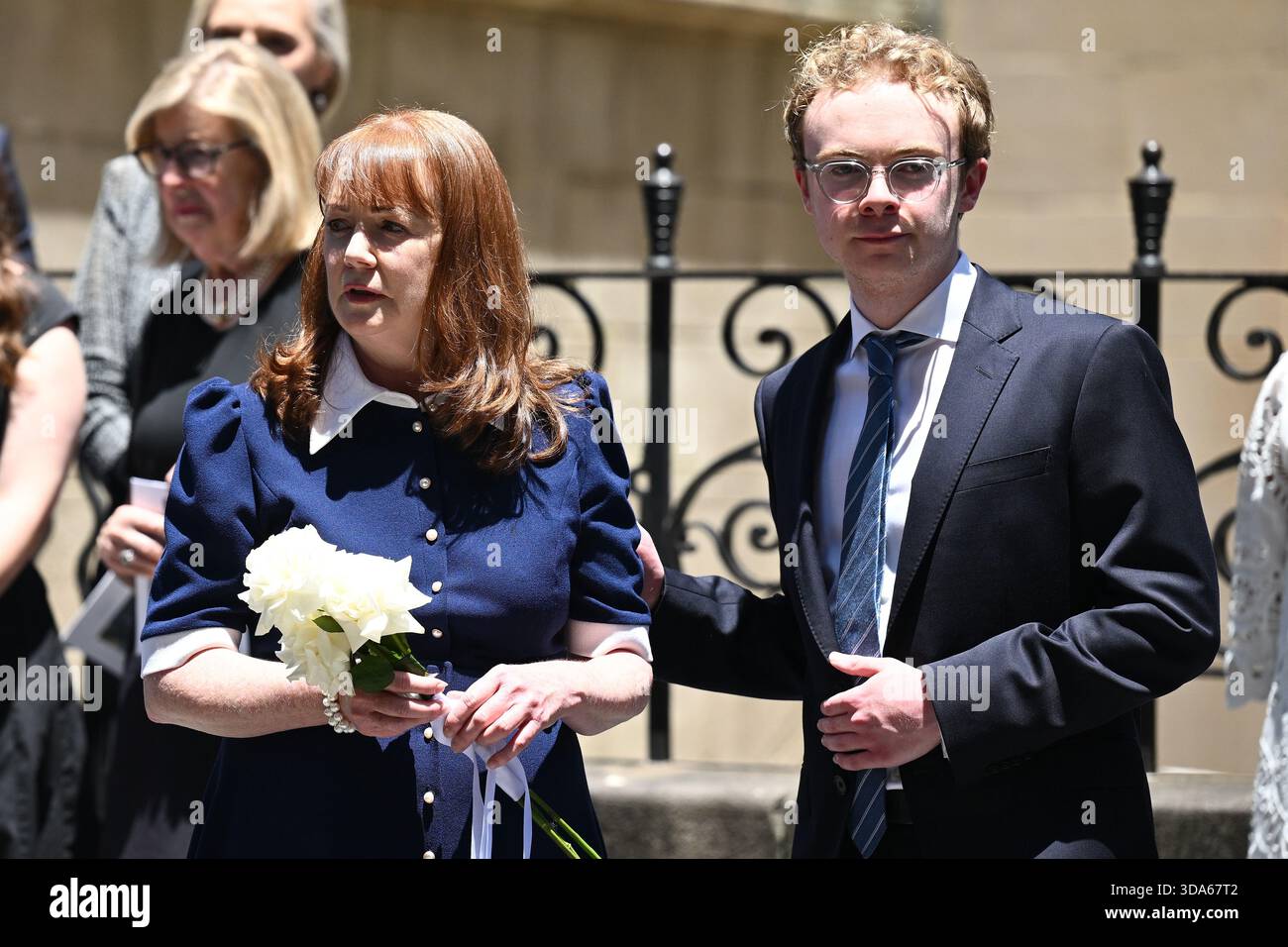 Graham Richardson’s wife Amanda and son Darcy watch on following the ...