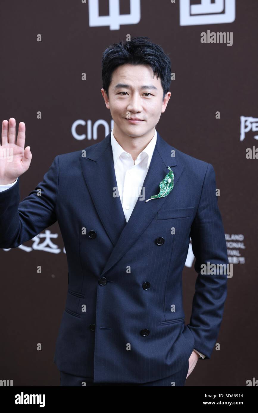 Chinese actor Huang Xuan attends the China premiere of Avatar: Fire and ...