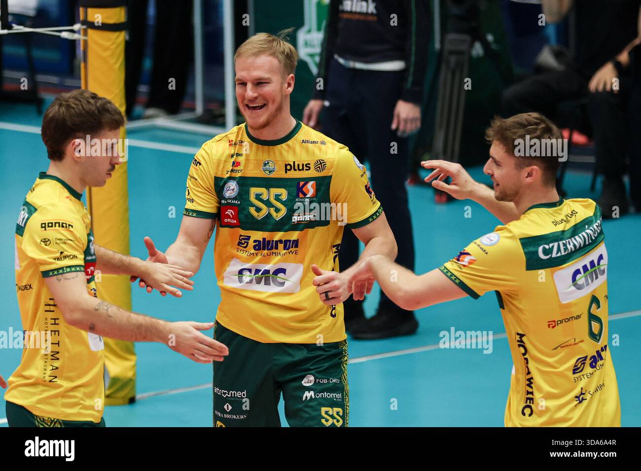 Kyle Ensing of Aluron CMC Warta Zawiercie (C) celebrates after winning ...