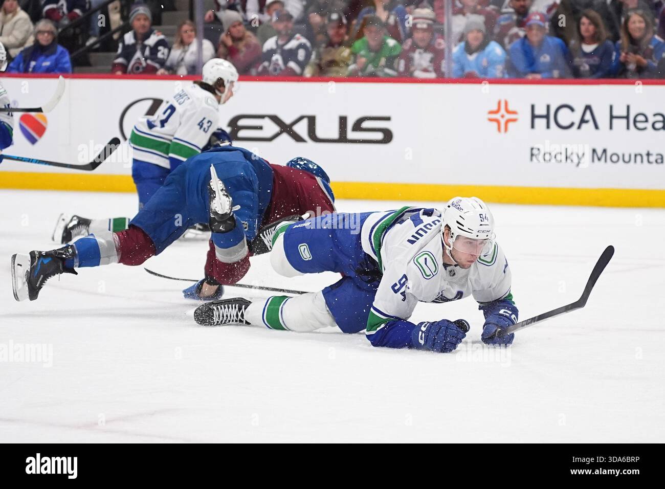 Vancouver Canucks center Linus Karlsson (94) collides with Colorado ...