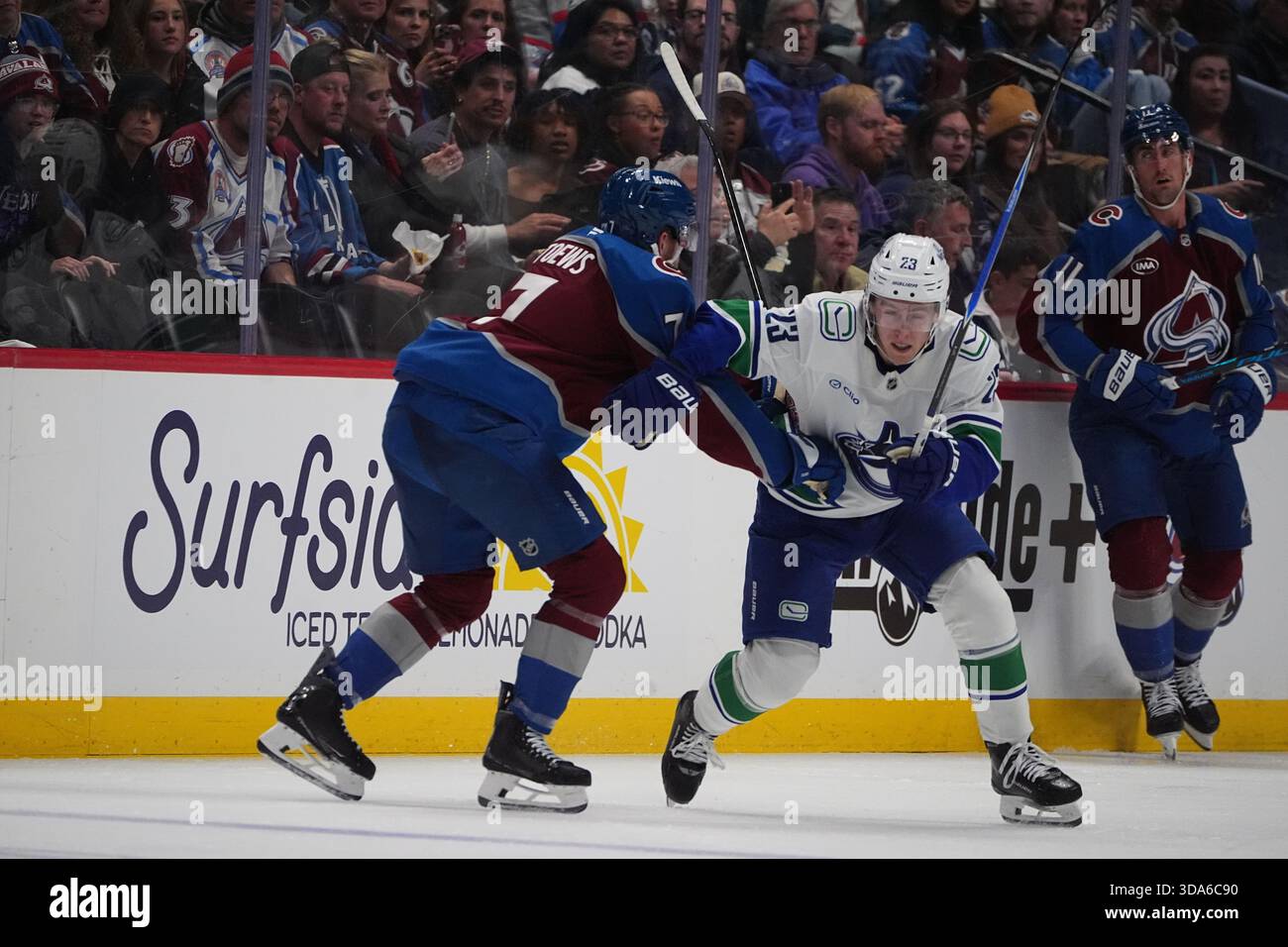 Colorado Avalanche defenseman Devon Toews (7) and Vancouver Canucks ...