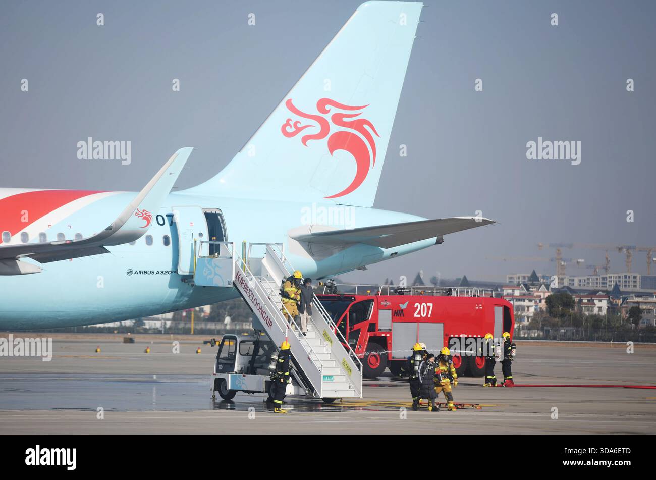 Firefighters assisted injured passengers on board a "distressed ...