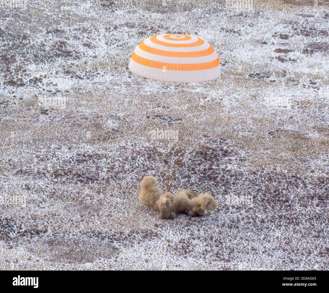 The Soyuz MS-27 spacecraft is seen as it lands in a remote area near ...
