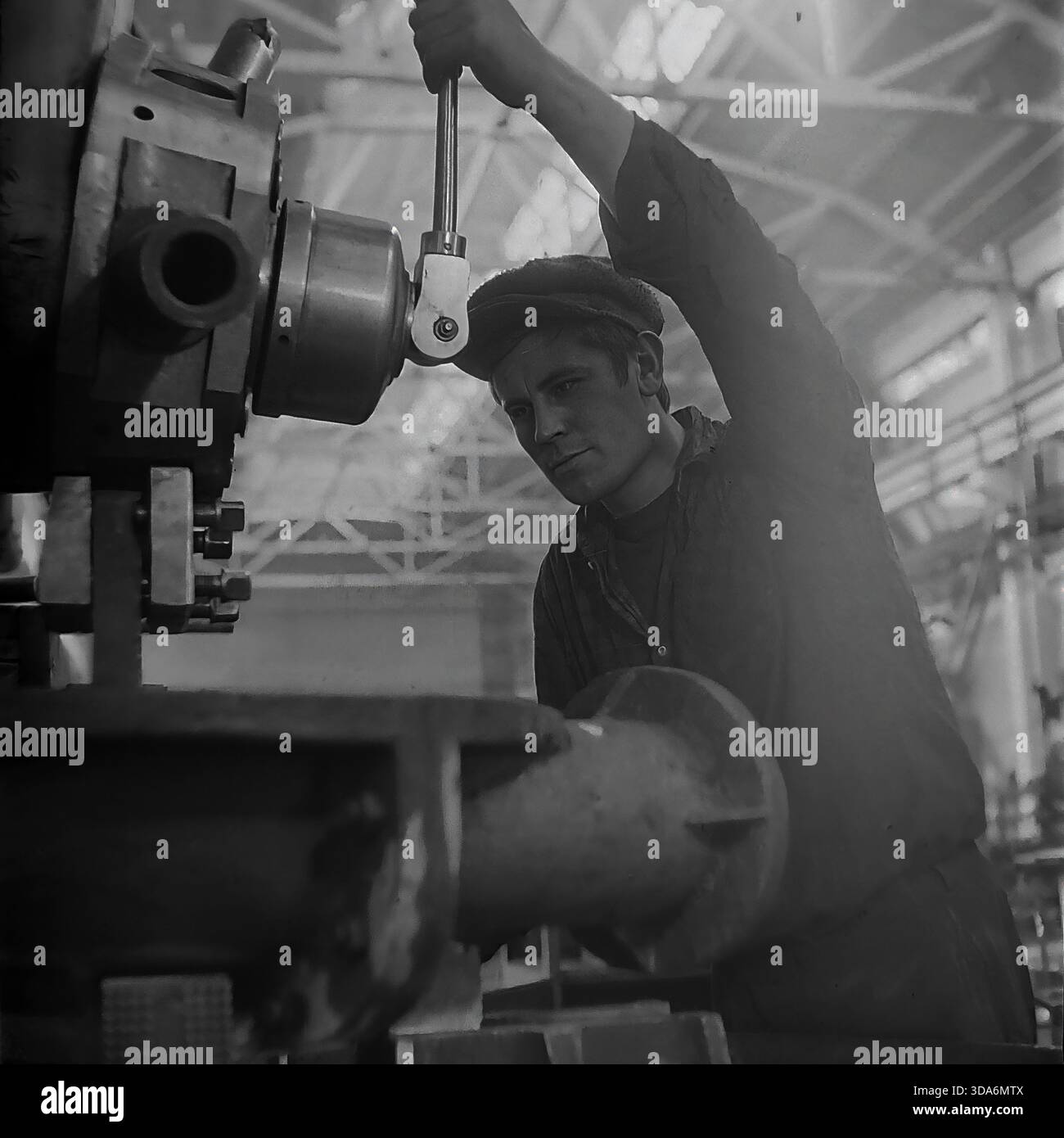 Slavyansk, Ukrainian SSR, USSR - 1970s: A young Soviet machinist in a ...