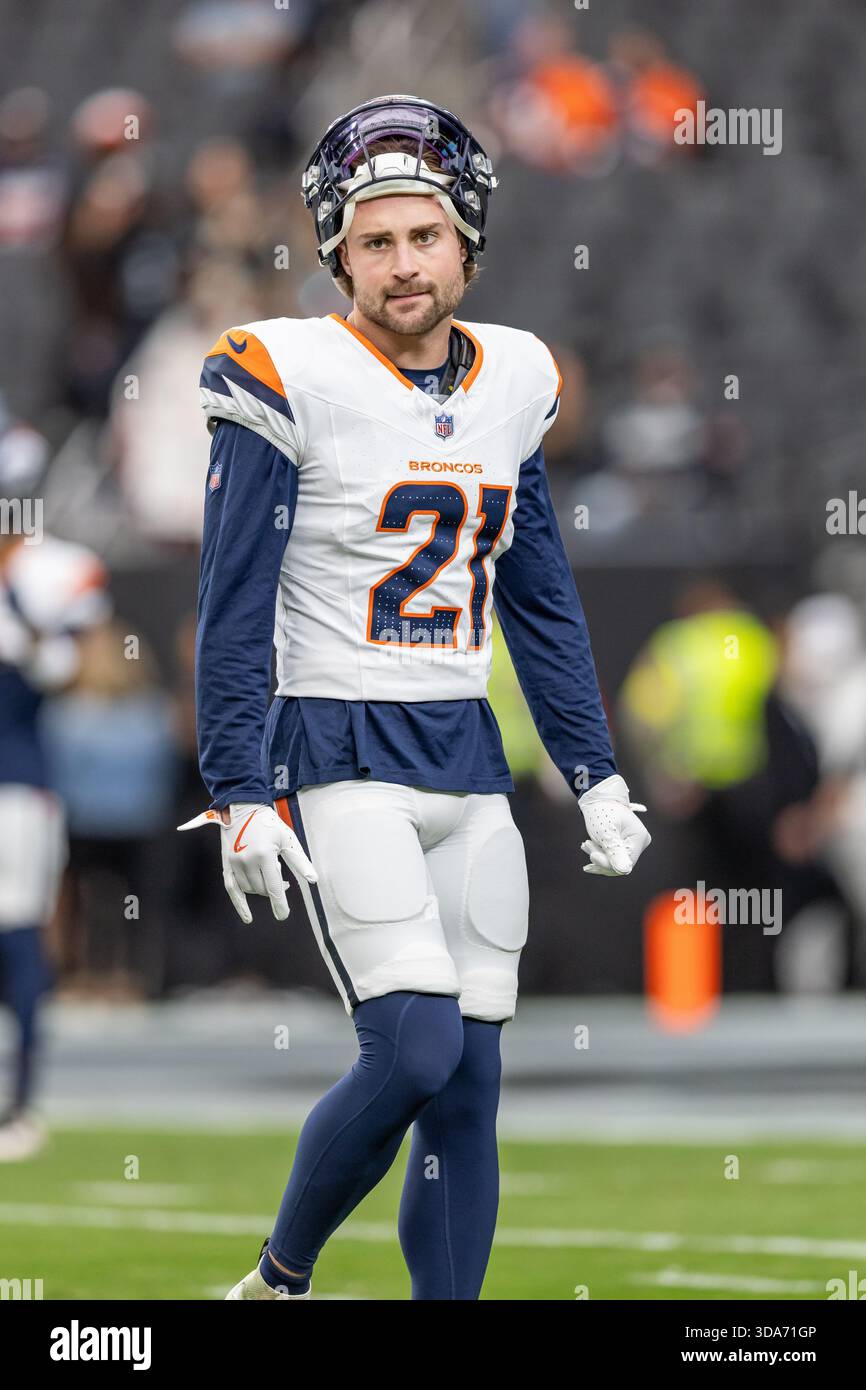 Denver Broncos cornerback Riley Moss (21) warms up before playing ...