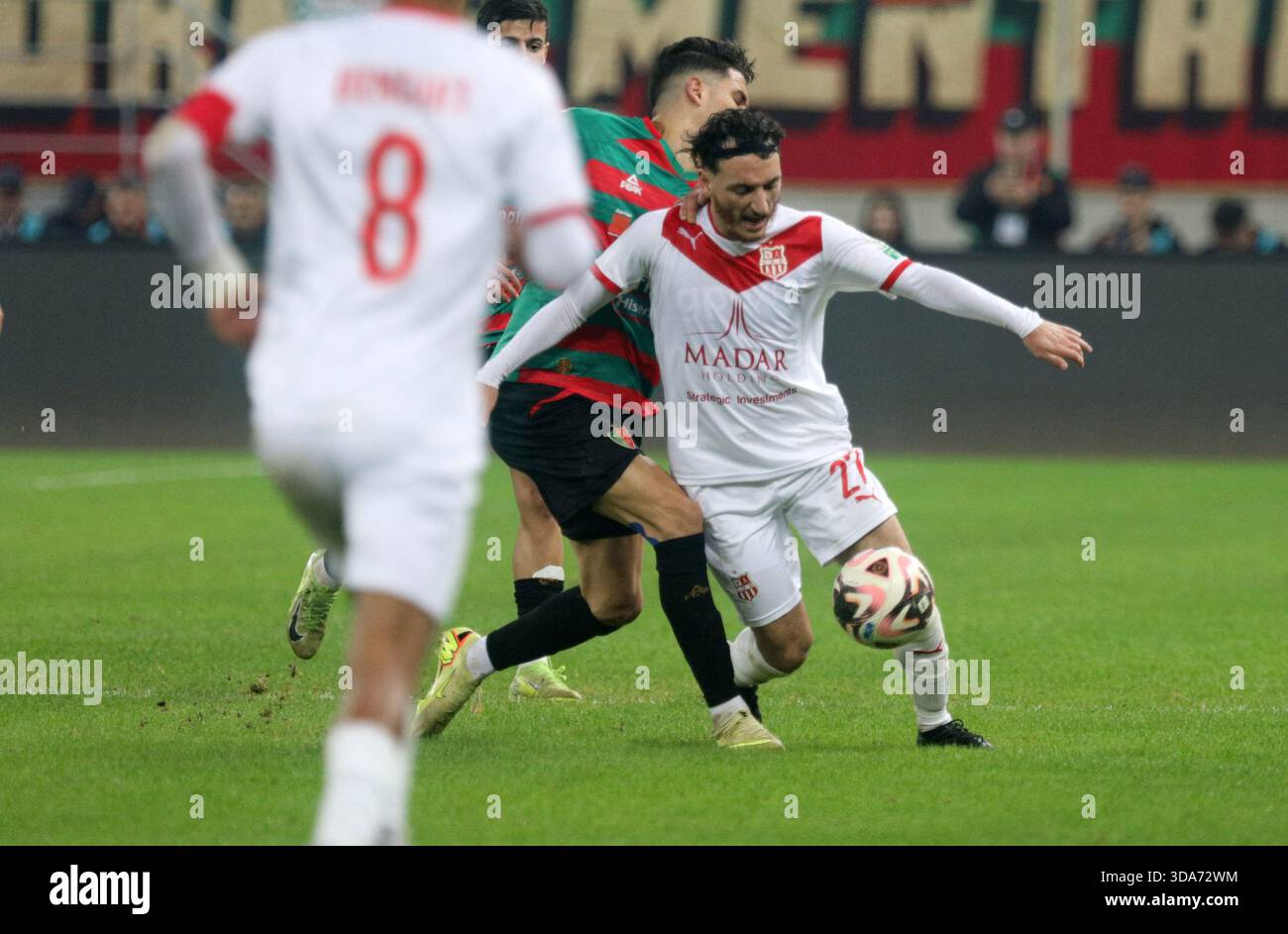 Djaaber Kaassis of CR Belouizdad fights for the ball with Zineddine ...
