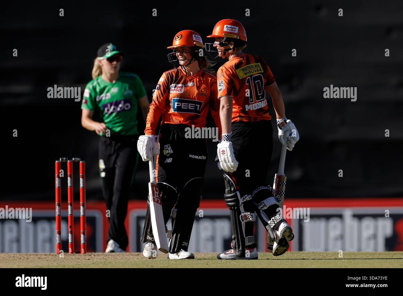 Katie Mack and Beth Mooney of the Scorchers are seen during the WBBL ...