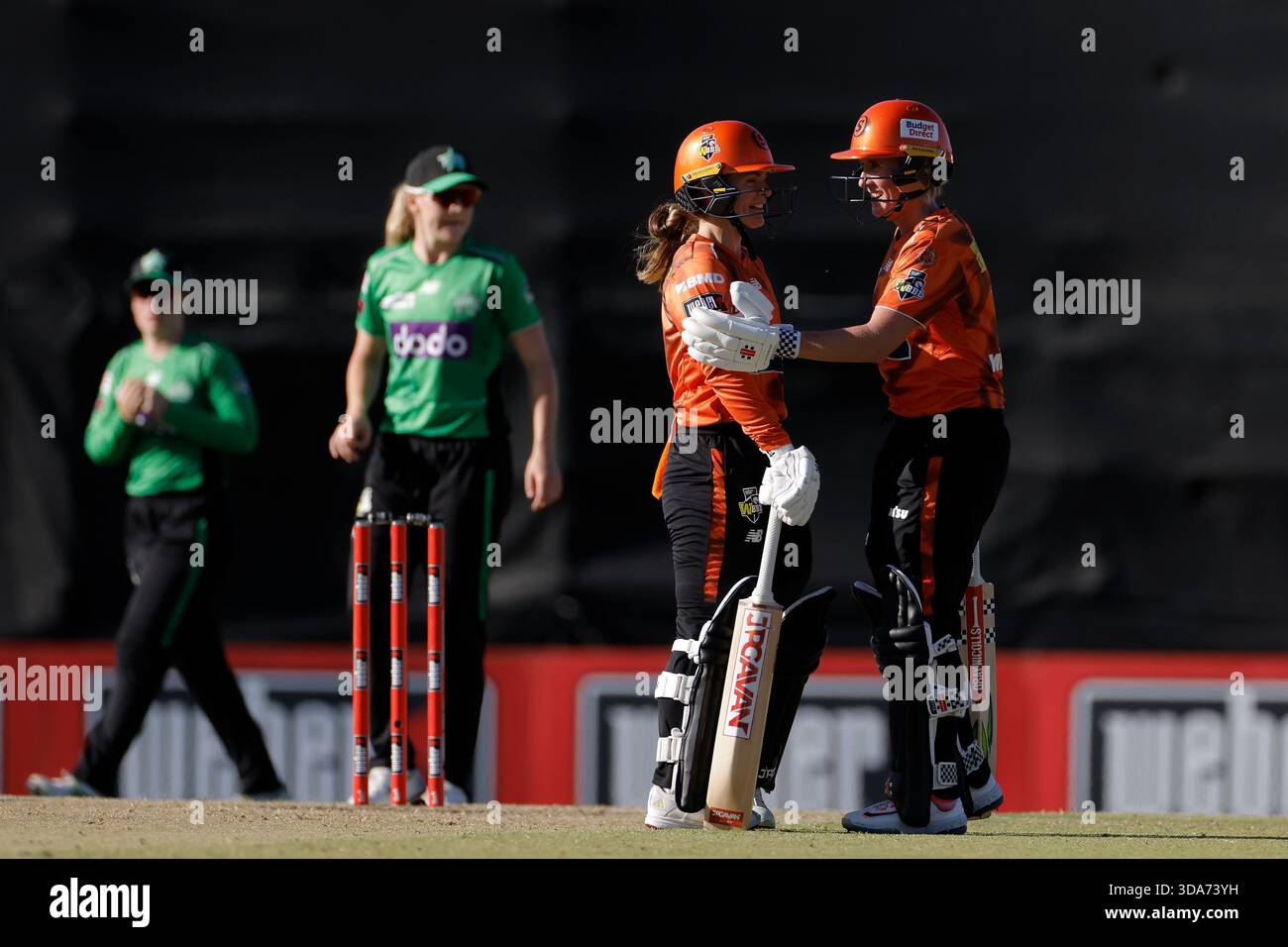 Katie Mack and Beth Mooney of the Scorchers are seen during the WBBL ...