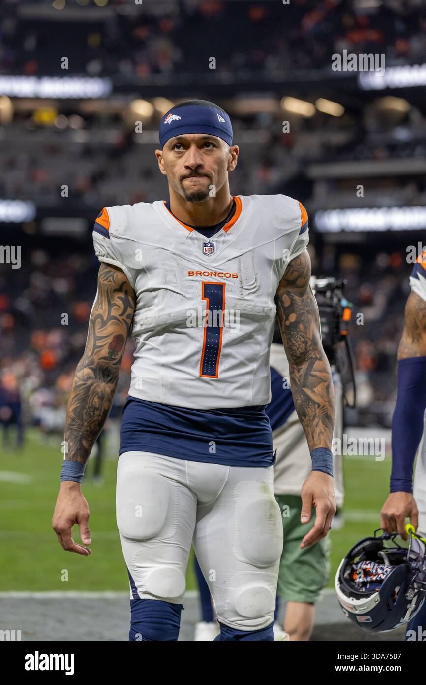 Denver Broncos tight end Evan Engram (1) walks off the field after the ...